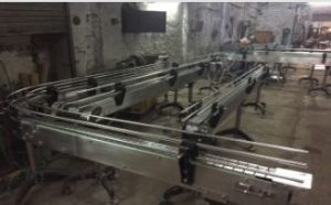 Slat Chain Conveyors – SAFESURGE Inspection Technologies Pvt. Ltd.